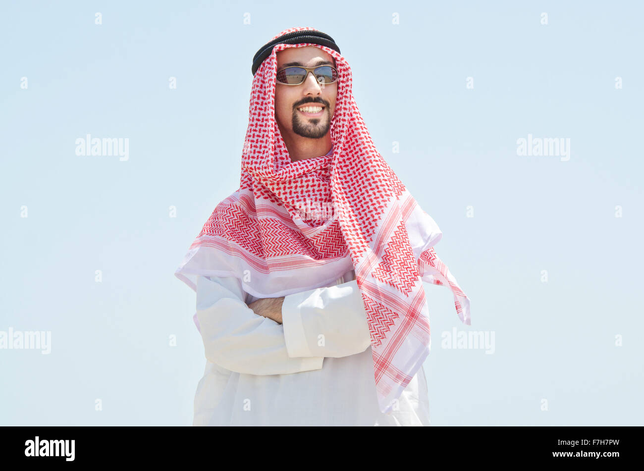 Arab on seaside in traditional clothing Stock Photo - Alamy