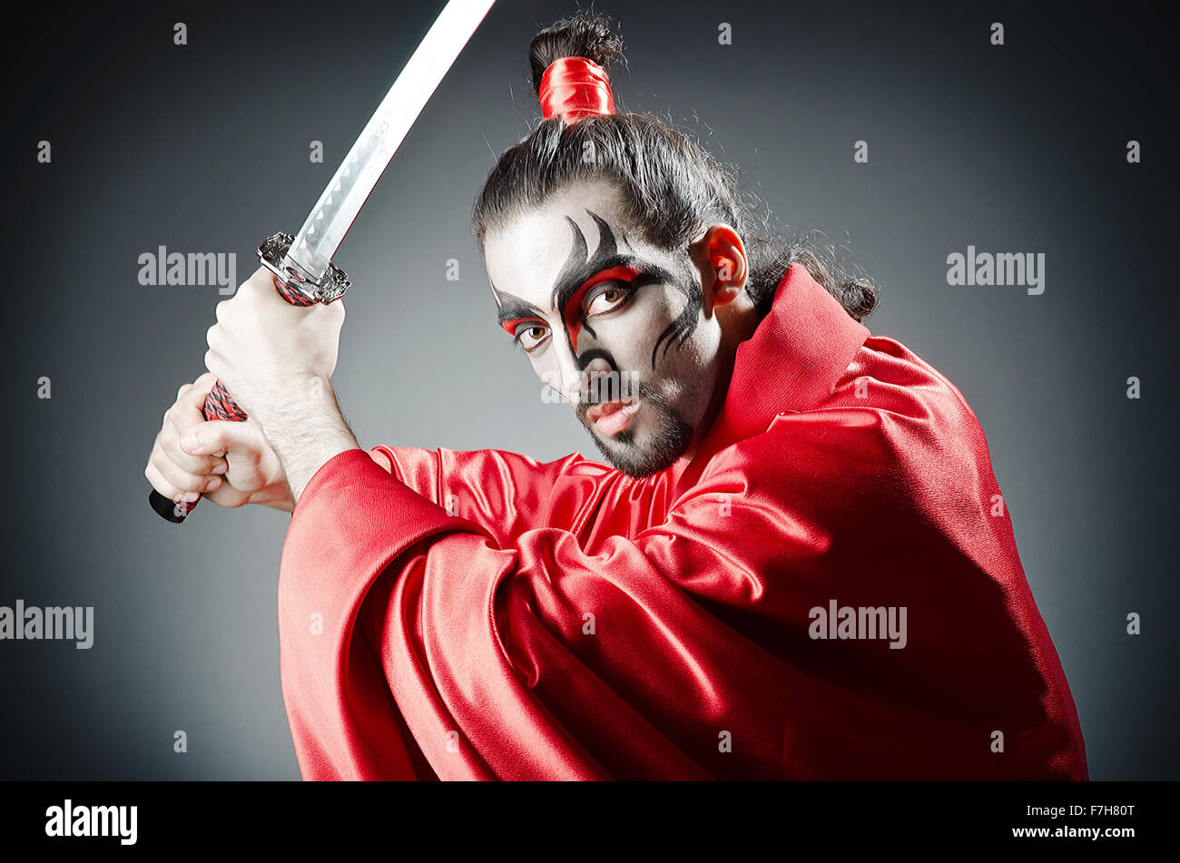 Japanese actor with sword Stock Photo - Alamy