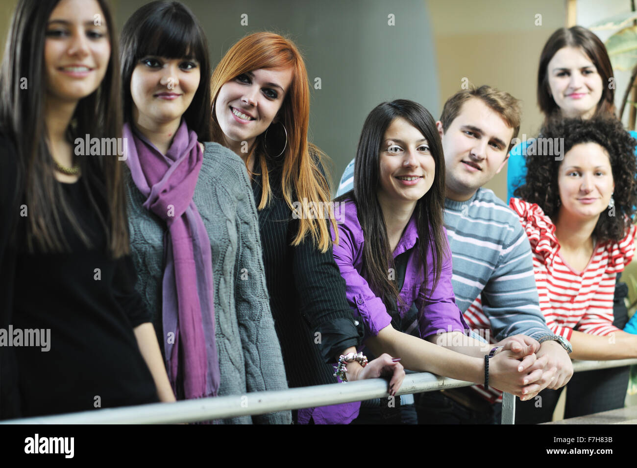 happy students people group portrait at university indoor building ...