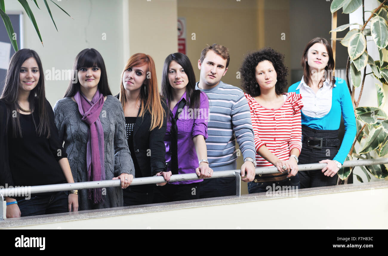 happy students people group portrait at university indoor building ...