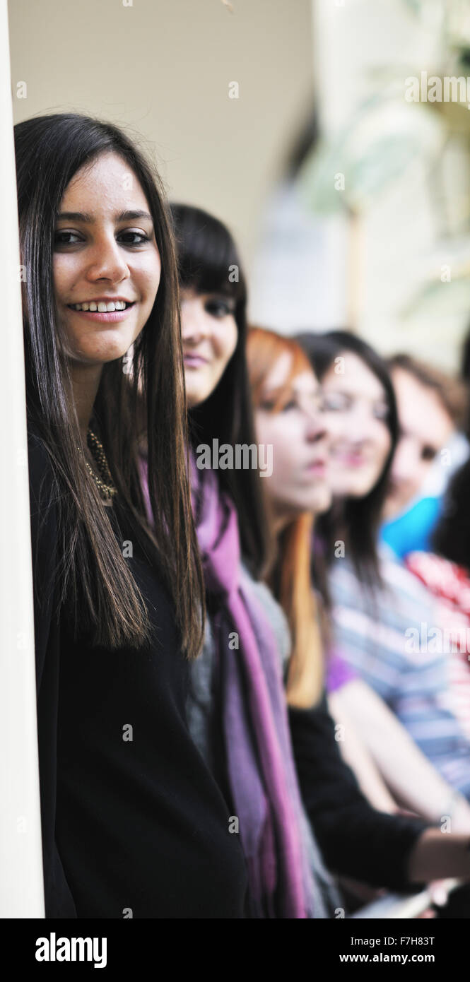 happy students people group portrait at university indoor building ...