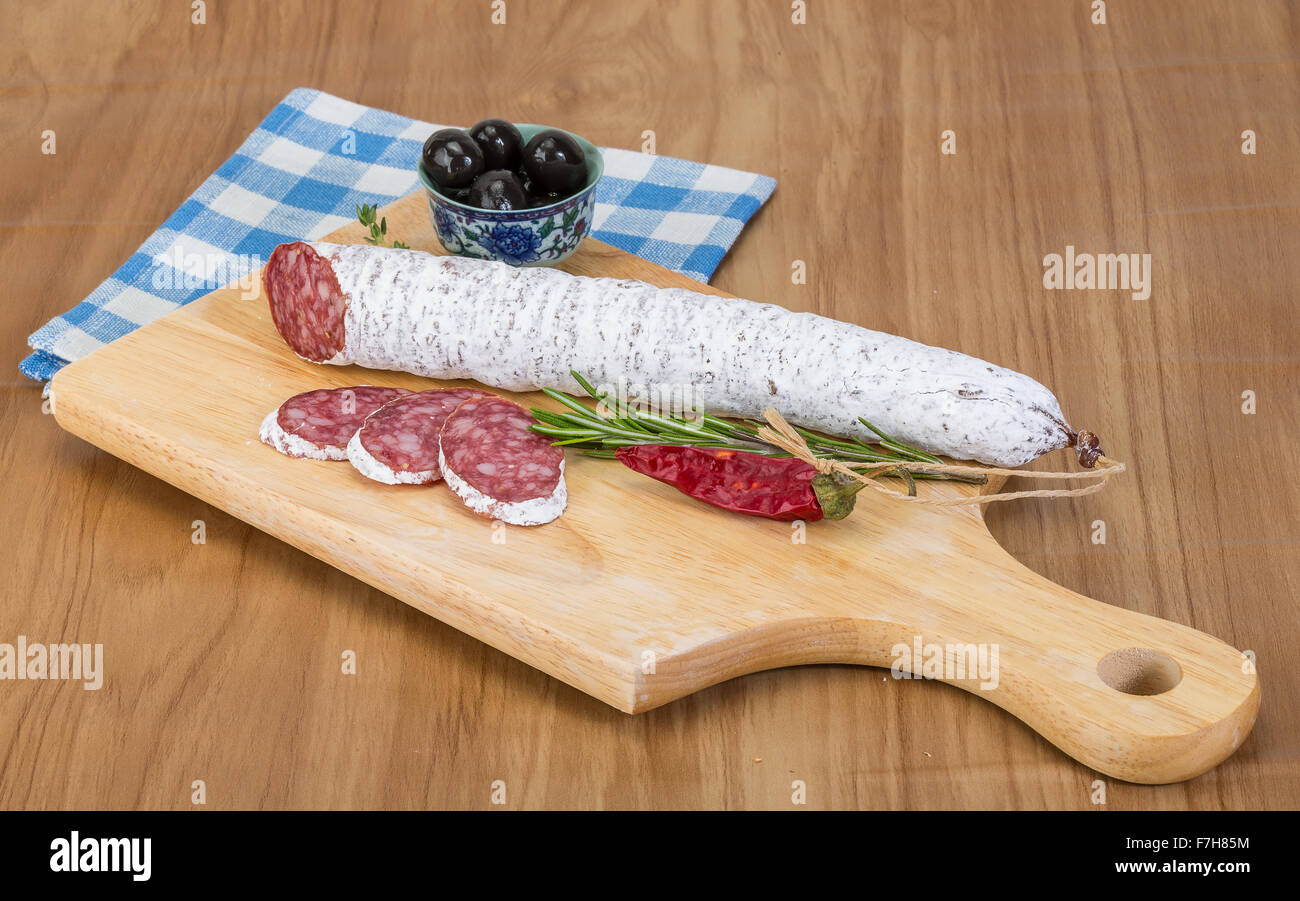 Fuet sausage - Spanish meat sliced with herbs Stock Photo - Alamy
