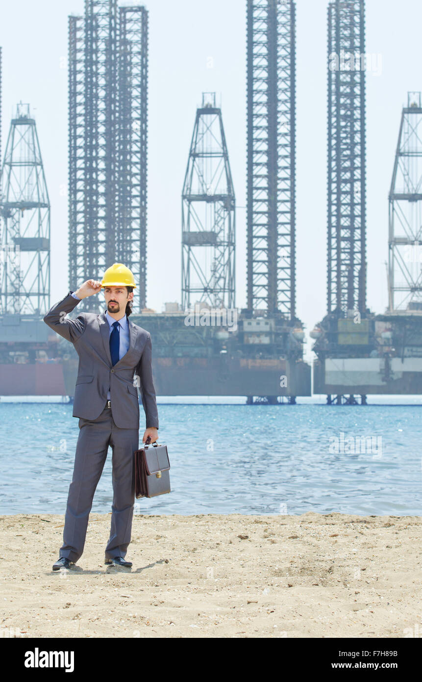 Oil engineer on sea side beach Stock Photo - Alamy