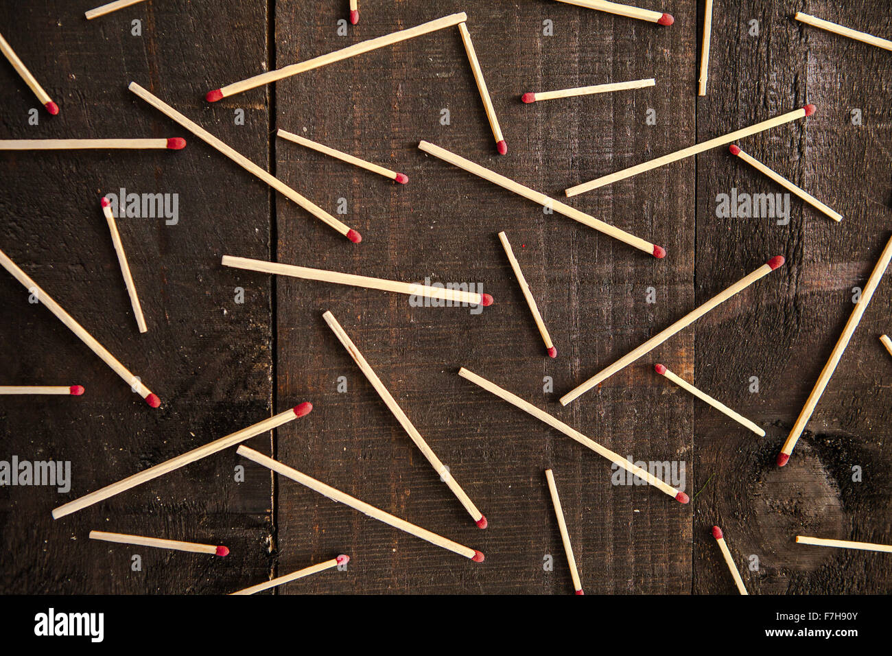 Group of matches on a wood background Stock Photo - Alamy
