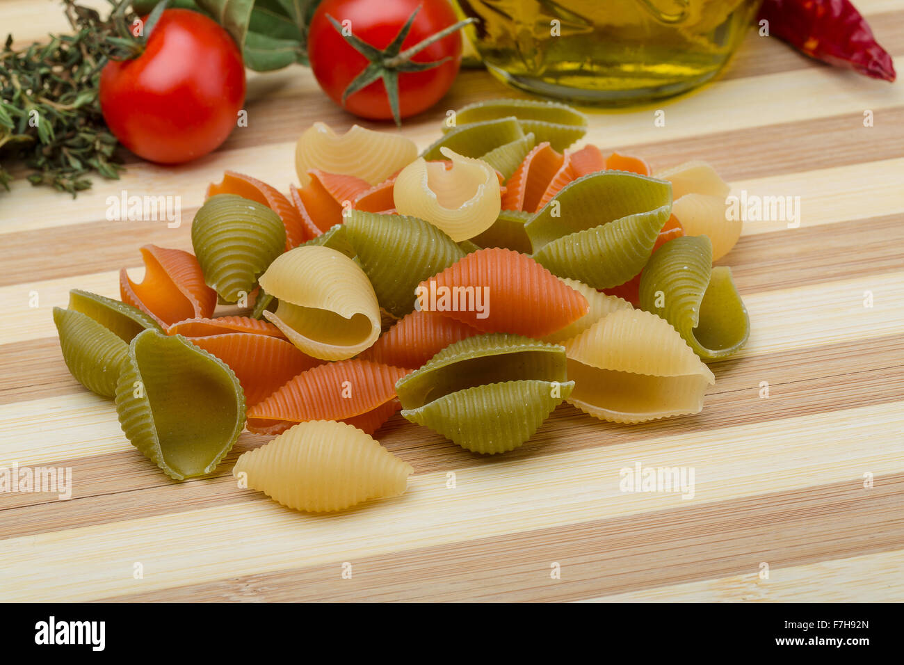 Pipe rigate pasta on the wood background Stock Photo - Alamy