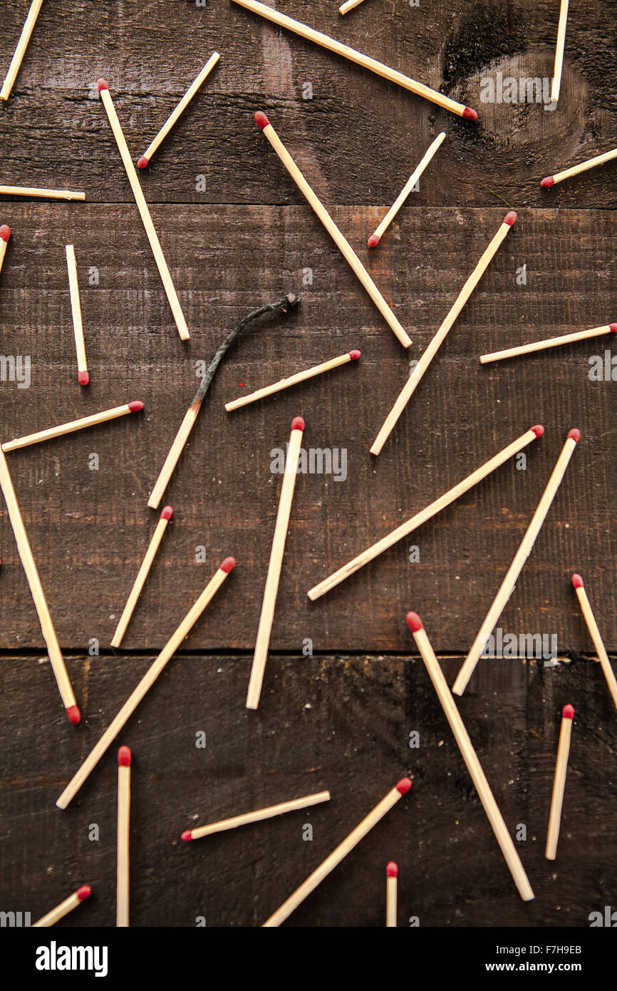 Group of matches on a wood background Stock Photo - Alamy
