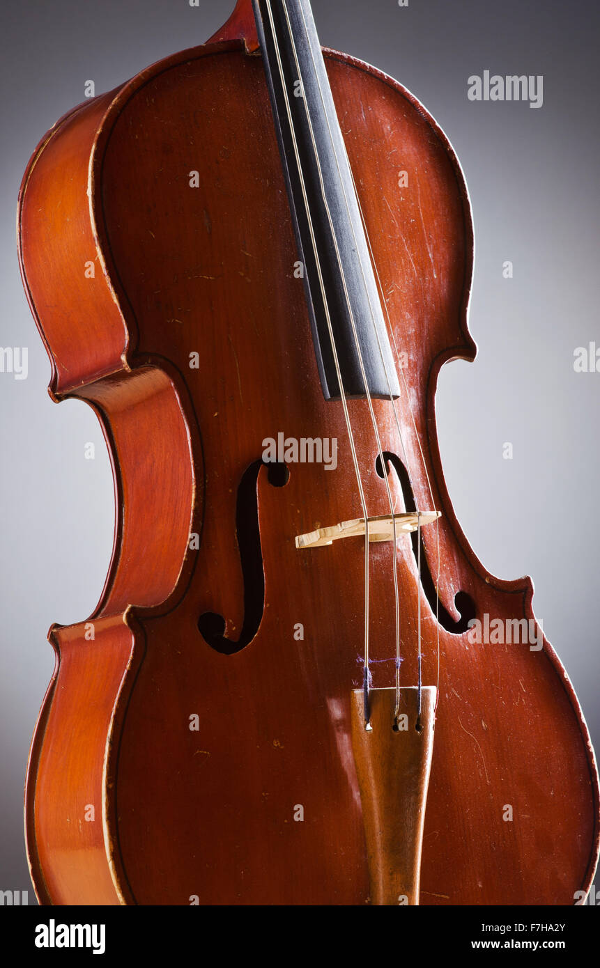 Music Cello in the dark room Stock Photo - Alamy
