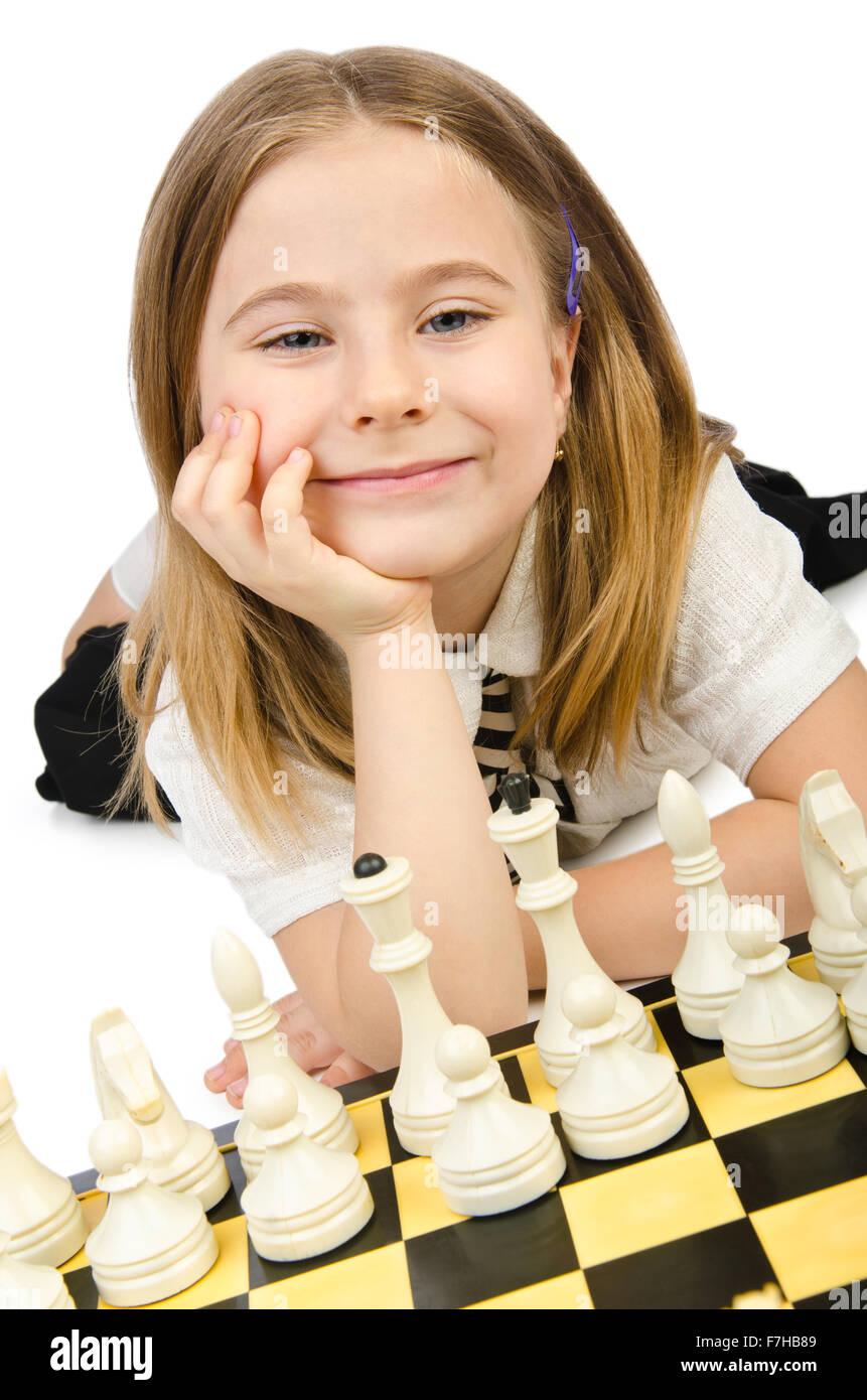 Cute girl playing chess on white Stock Photo - Alamy