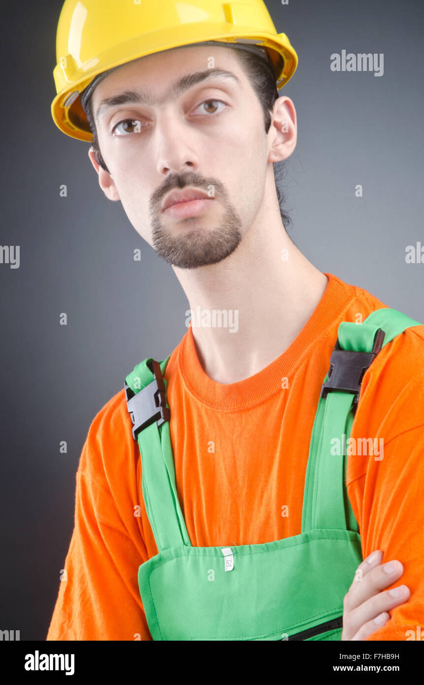 Construction worker in studio shooting Stock Photo - Alamy