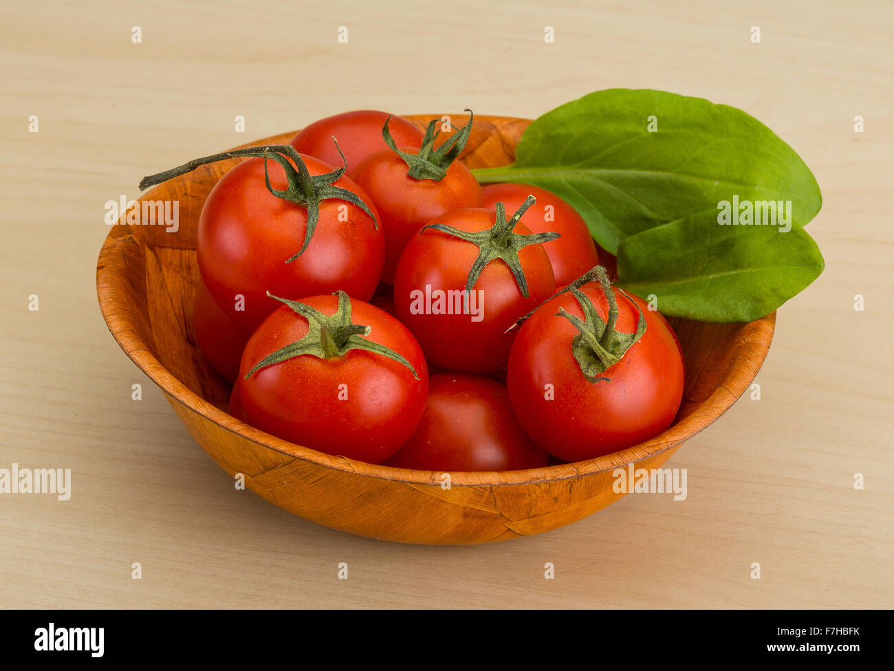 Fresh ripe Cherry tomatoes in the basket Stock Photo - Alamy