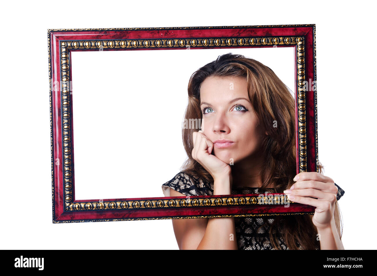 Young woman with picture frame on white Stock Photo - Alamy