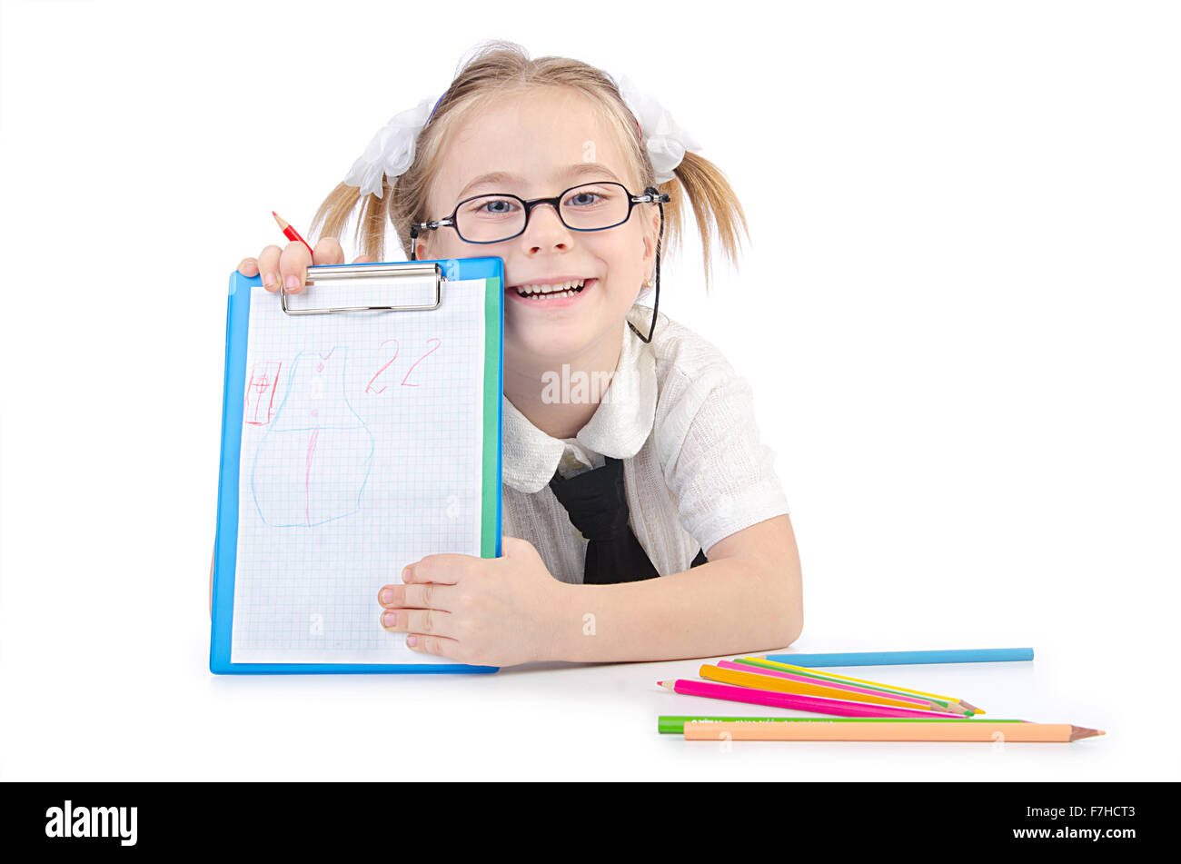 Little girl writing with pencils Stock Photo - Alamy