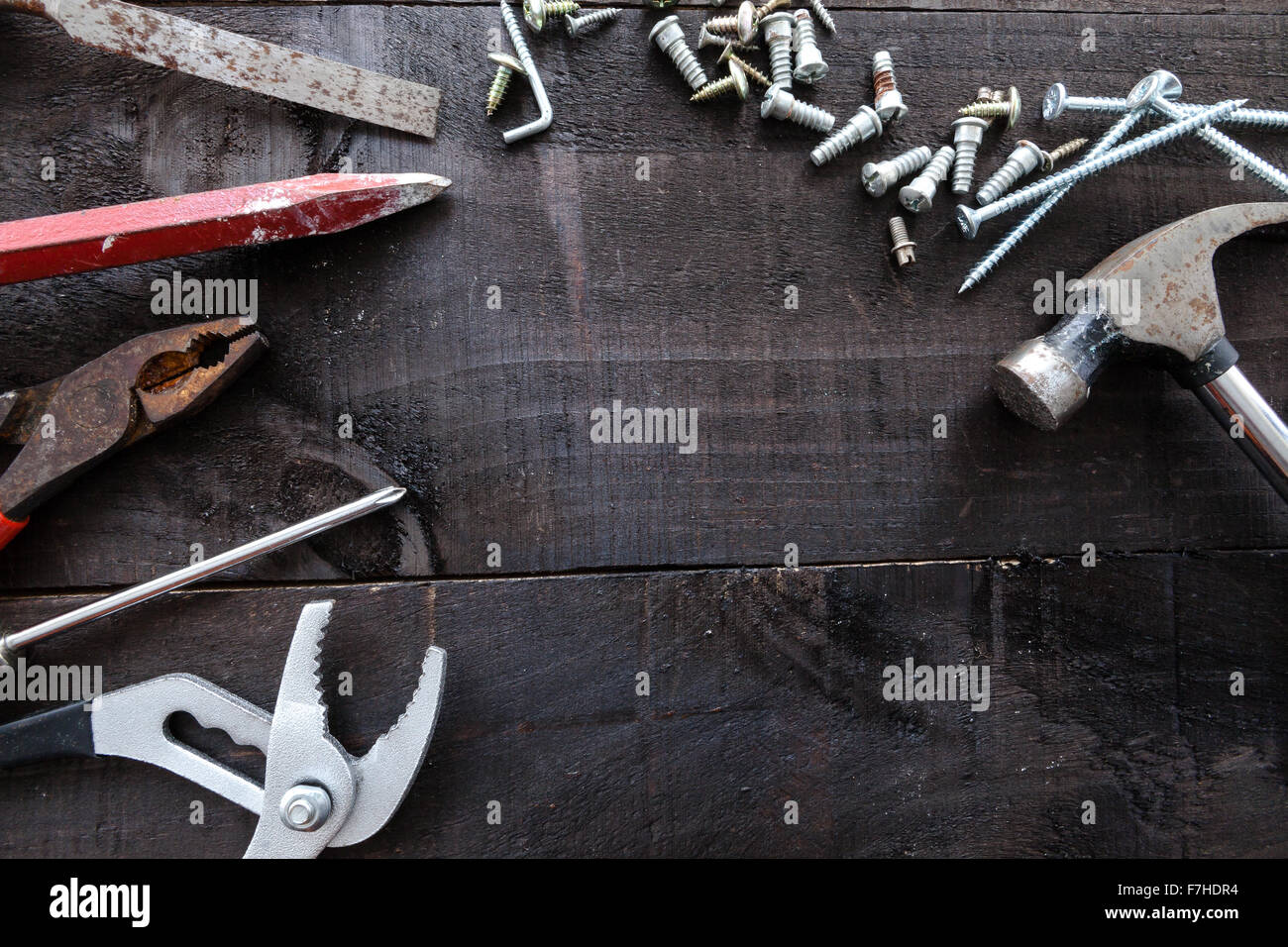 Still life containing several tools in dark wood background Stock Photo ...