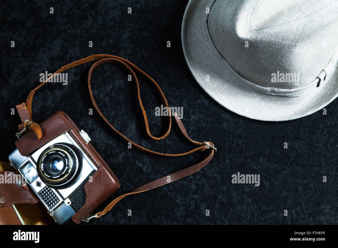 The image represents a set of objects related to photography on black ...