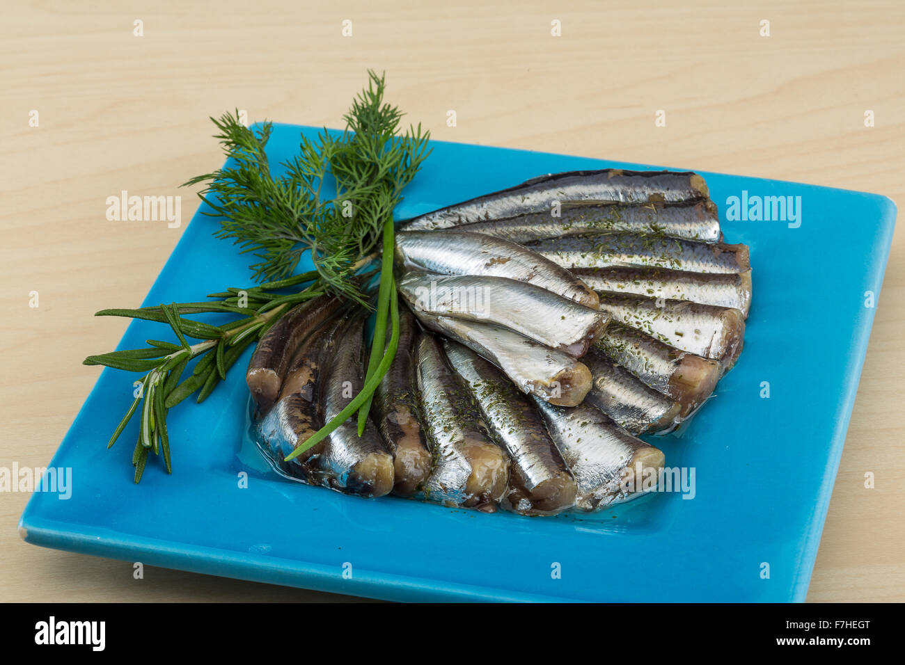 Salted anchovy with spices and herbs - ready for eat Stock Photo - Alamy
