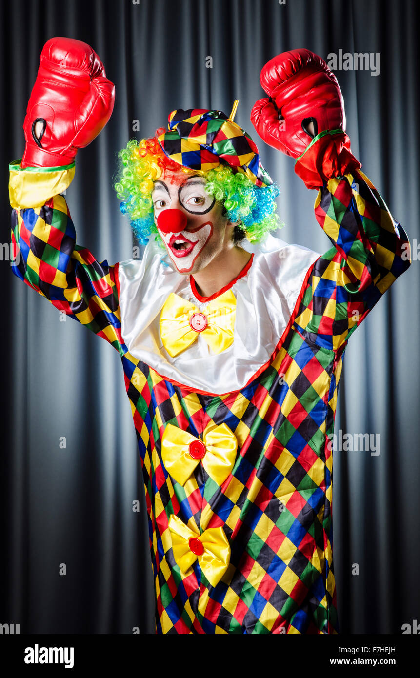 Funny clown in the studio shooting Stock Photo - Alamy