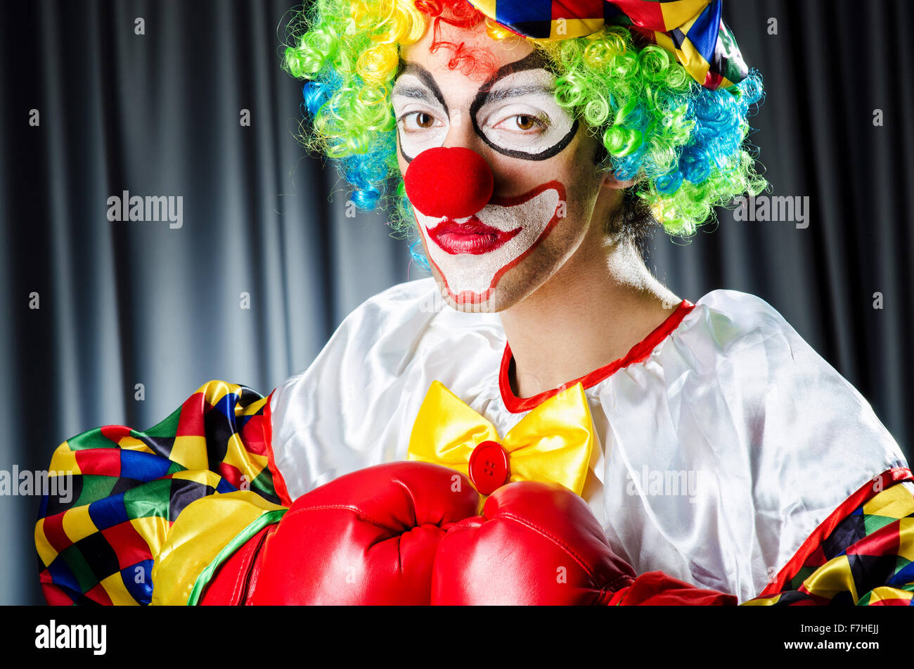 Funny clown in the studio shooting Stock Photo - Alamy