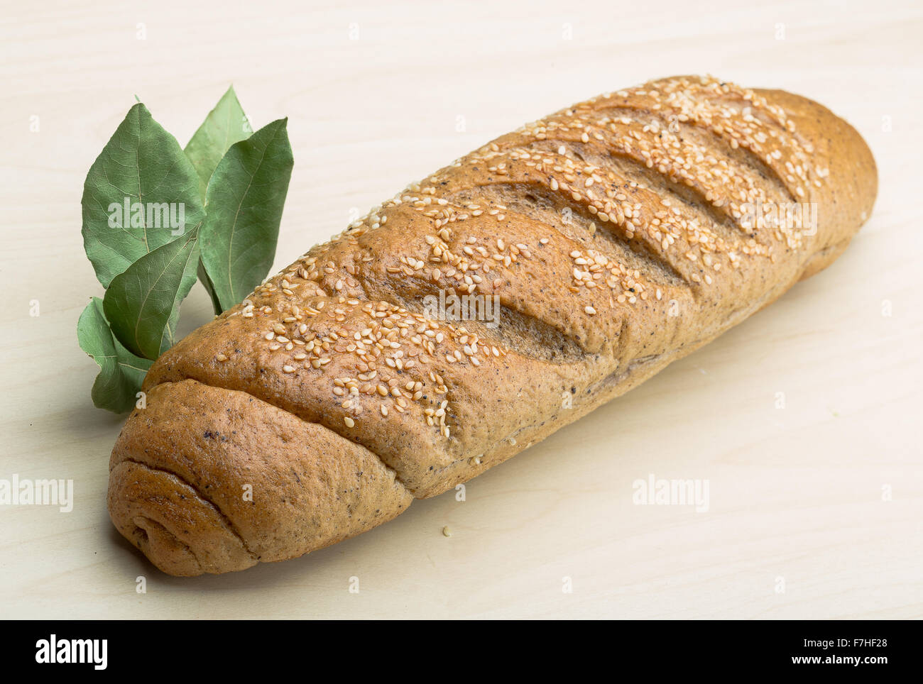 Bread - loaf with seeds and spices leaves Stock Photo - Alamy