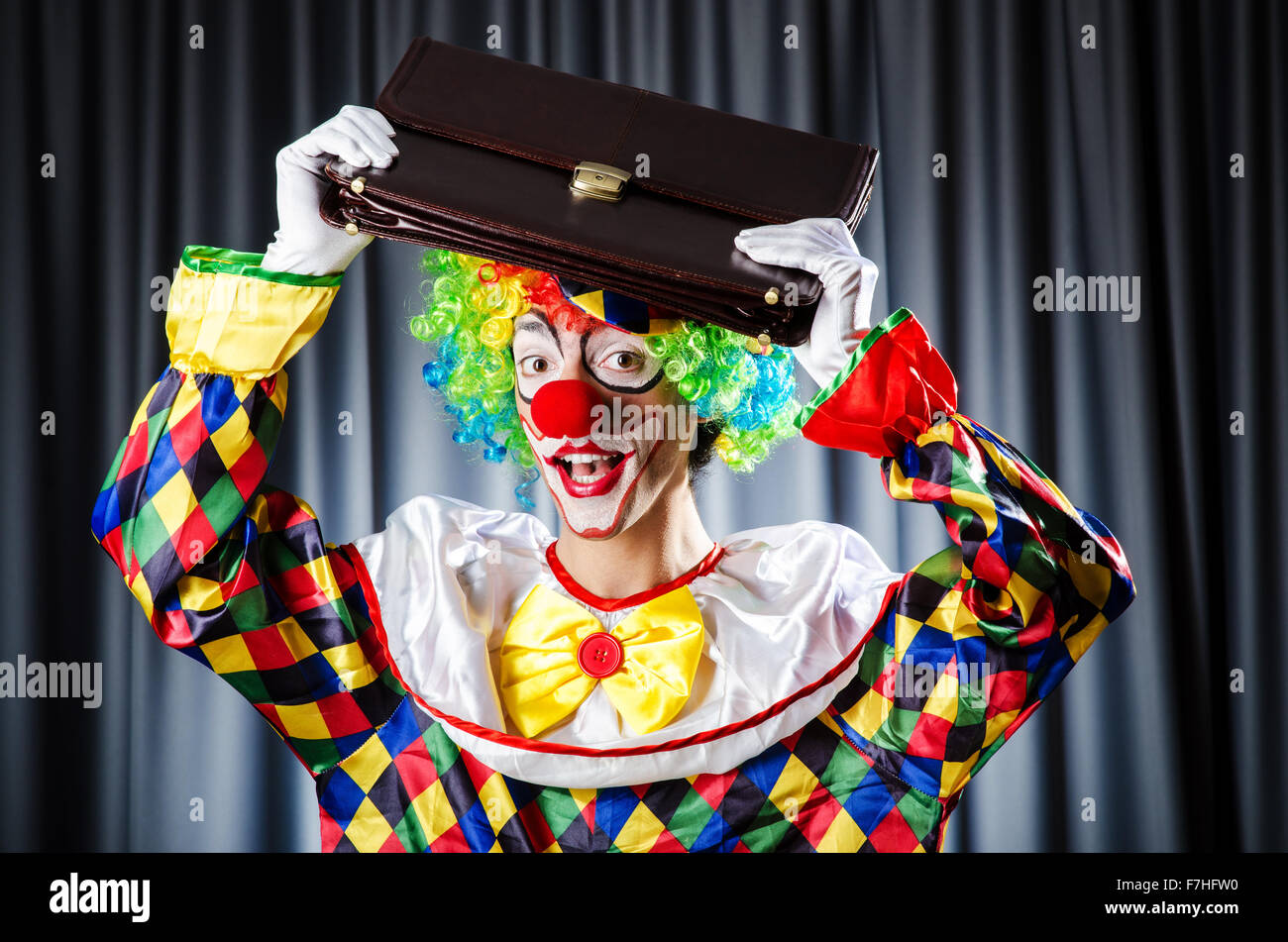 Funny clown in the studio shooting Stock Photo - Alamy