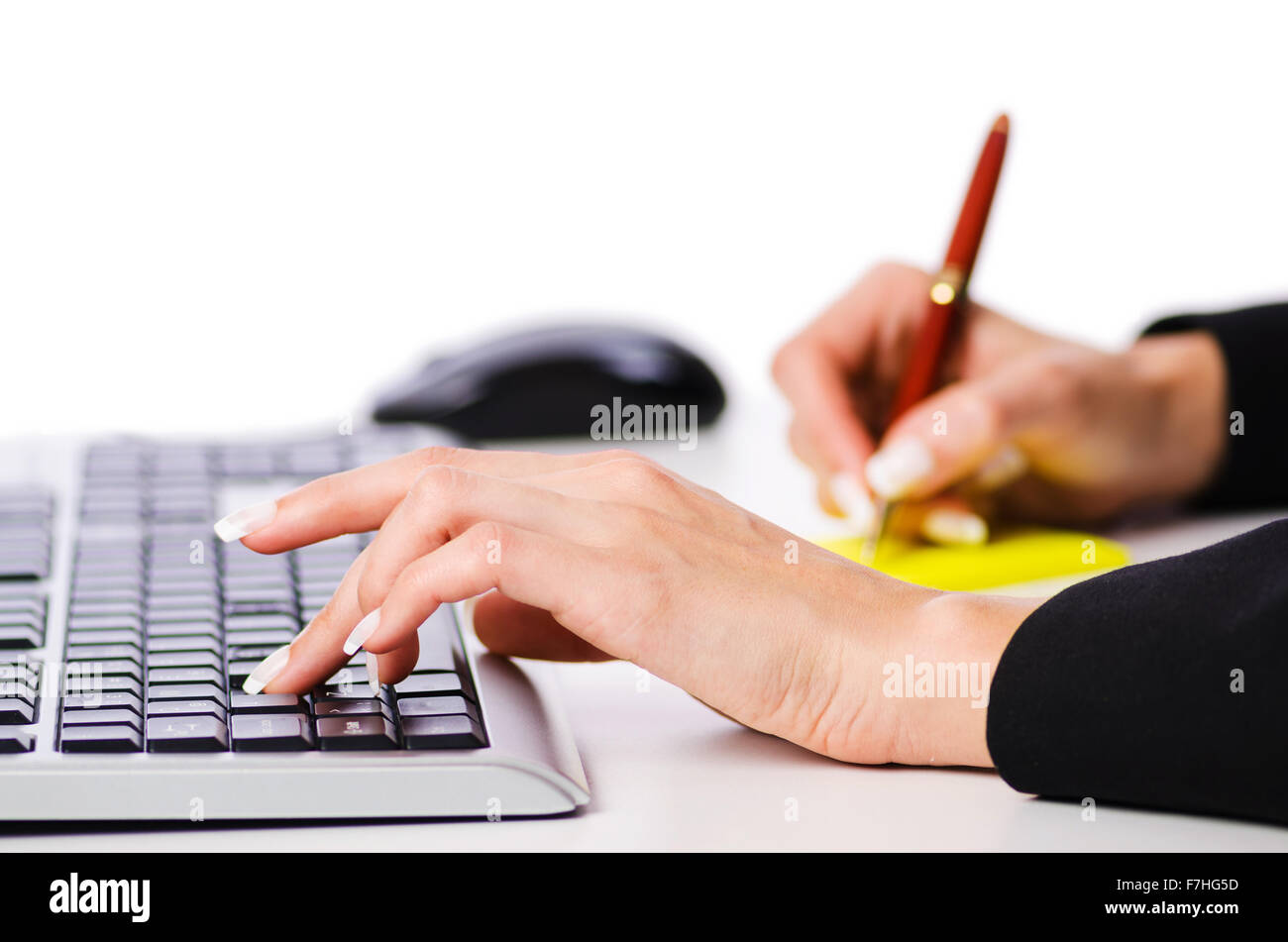 Hands working on the keyboard Stock Photo - Alamy