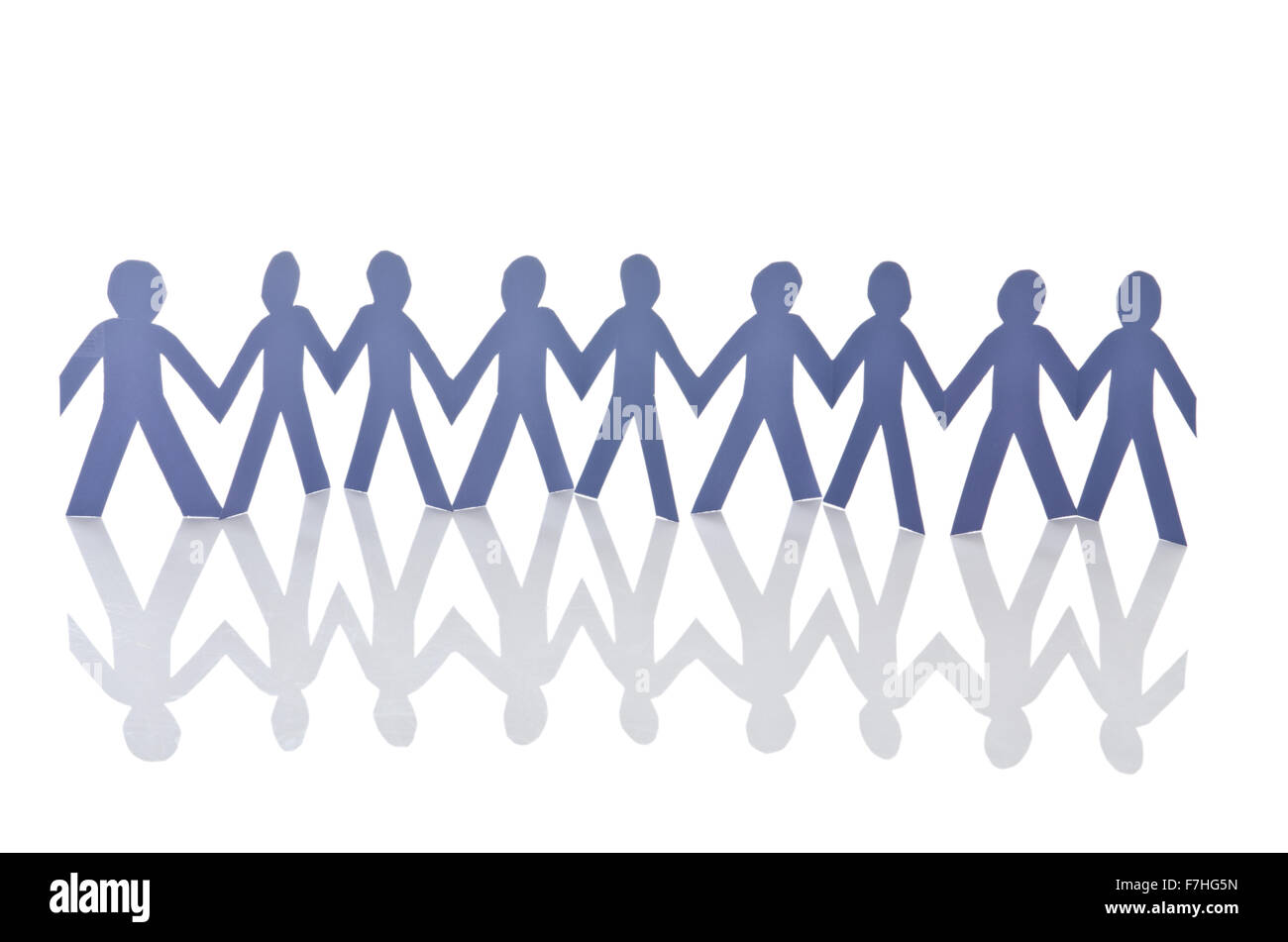 Teamwork concept with paper cut people Stock Photo - Alamy