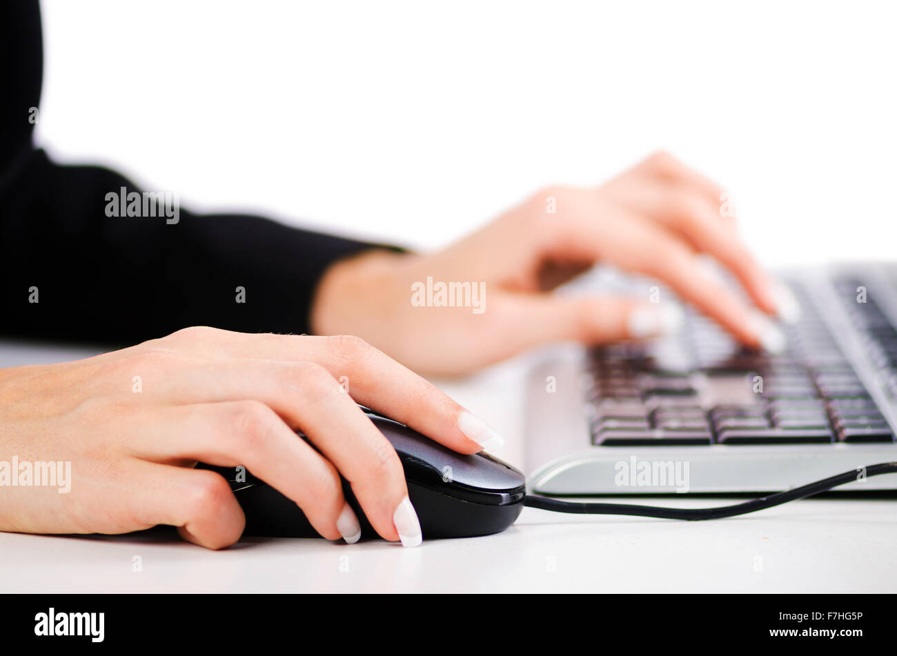 Hands working on the keyboard Stock Photo - Alamy