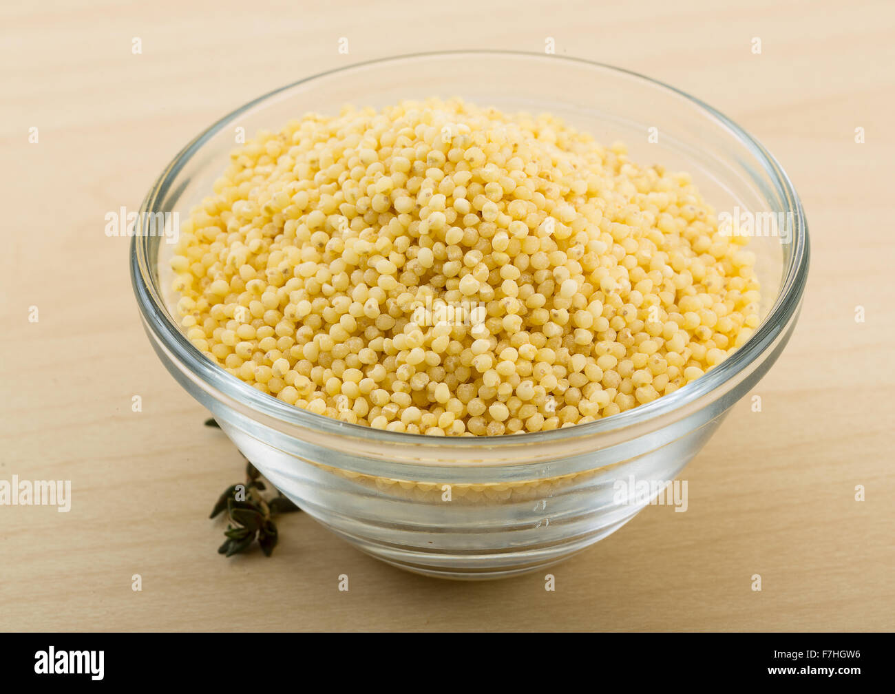 Dry couscous pile on the glass bowl Stock Photo - Alamy
