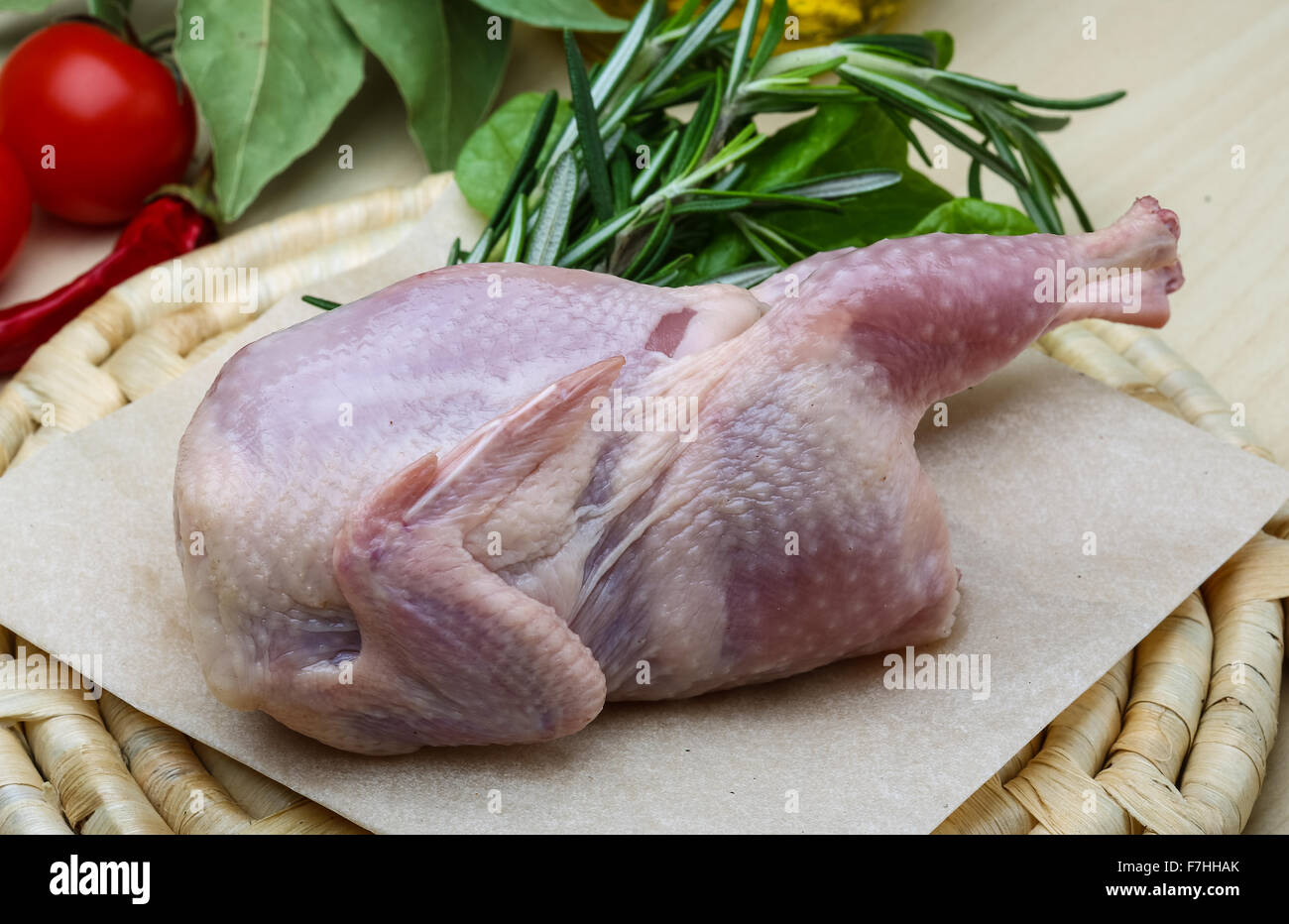 Raw quail with herbs ready for cooking Stock Photo - Alamy