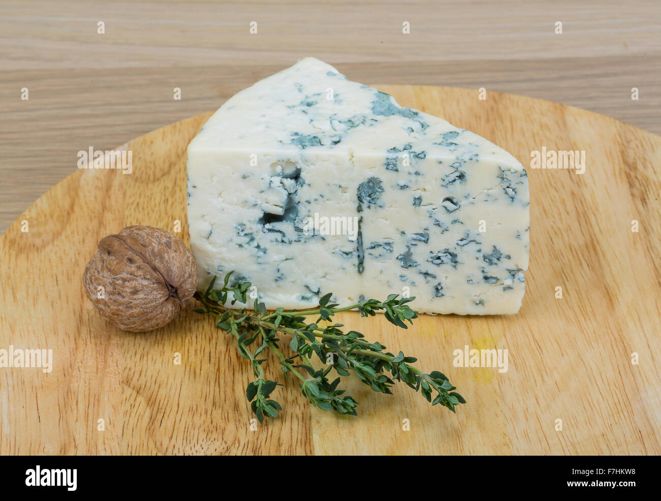Blue cheese with mold on the wood background Stock Photo - Alamy