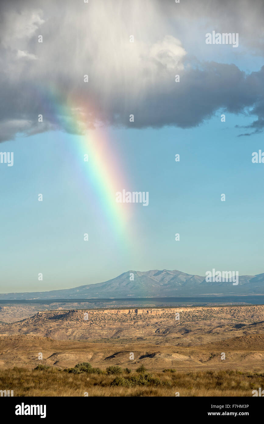 Rainbow over Cross Canyon with the Abajo Mountains in the background ...
