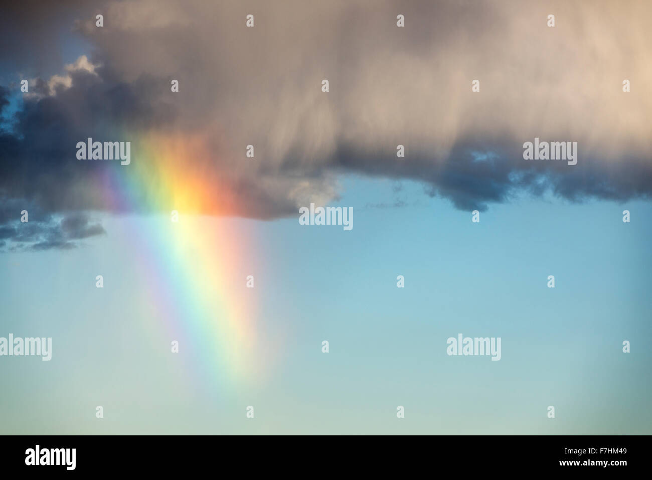 Rainbow and cloud Stock Photo - Alamy
