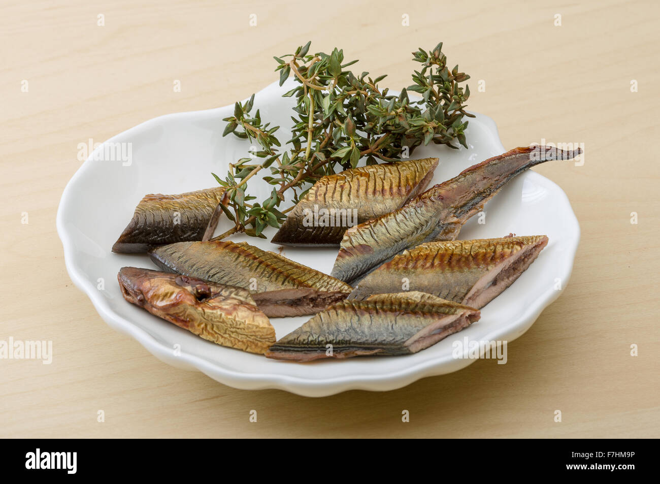 Smoked Lamprey - seafood delicacy with salad and herbs Stock Photo - Alamy