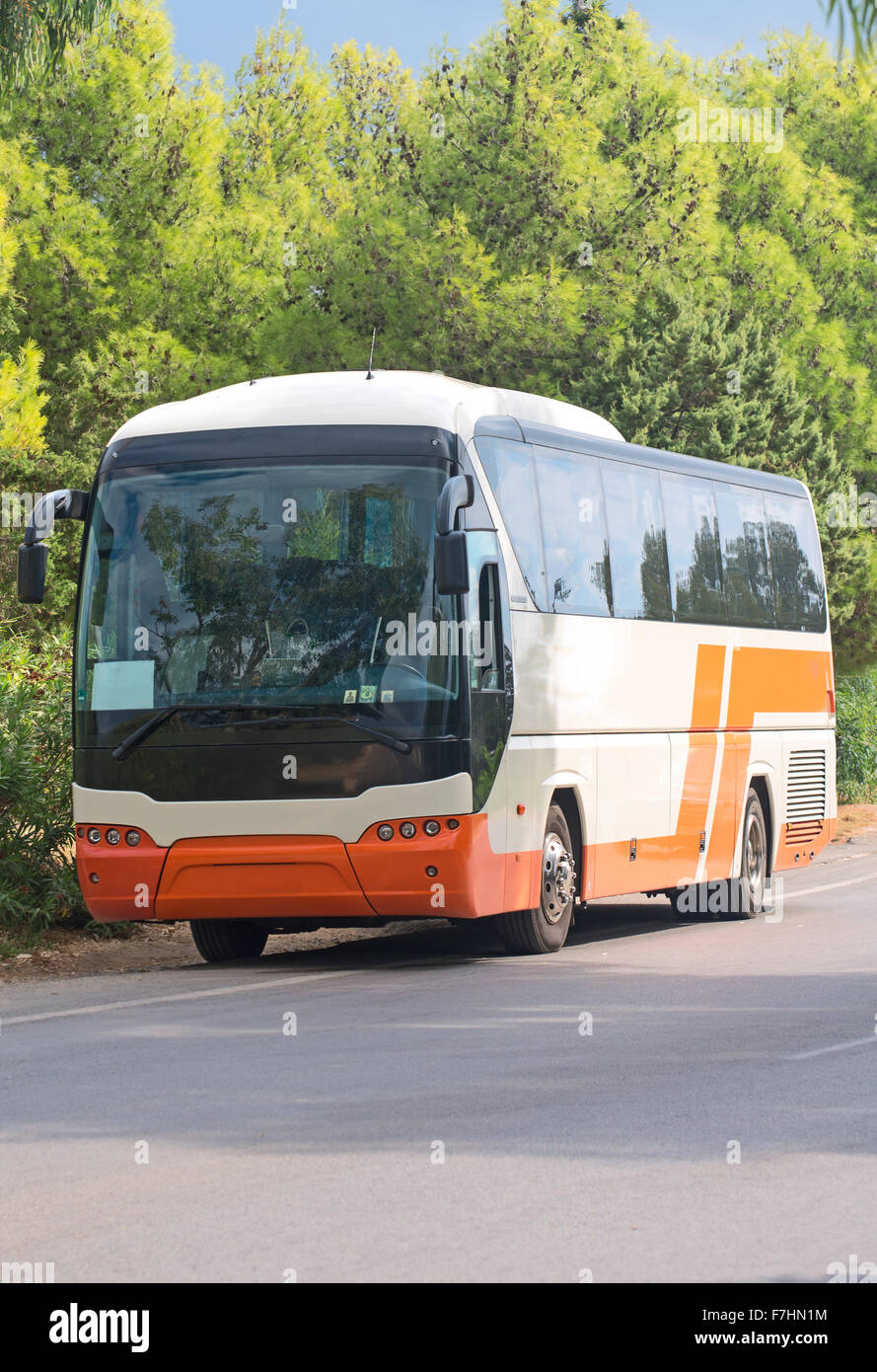 Empty tourist bus on the roadside Stock Photo - Alamy
