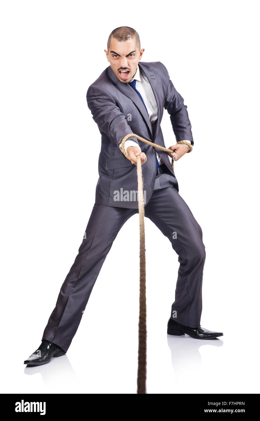 Man pulling the rope on white Stock Photo - Alamy