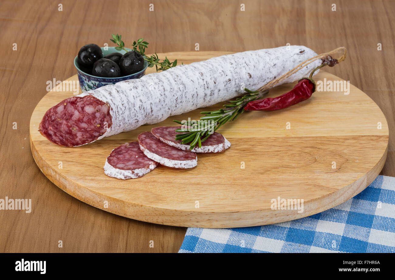 Fuet sausage - Spanish meat sliced with herbs Stock Photo - Alamy