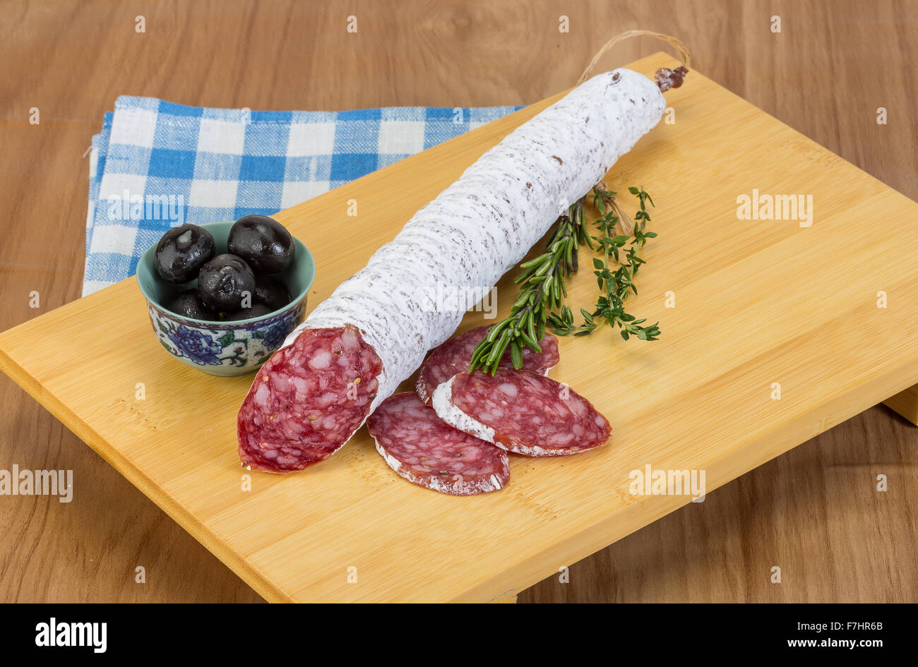 Fuet sausage - Spanish meat sliced with herbs Stock Photo - Alamy