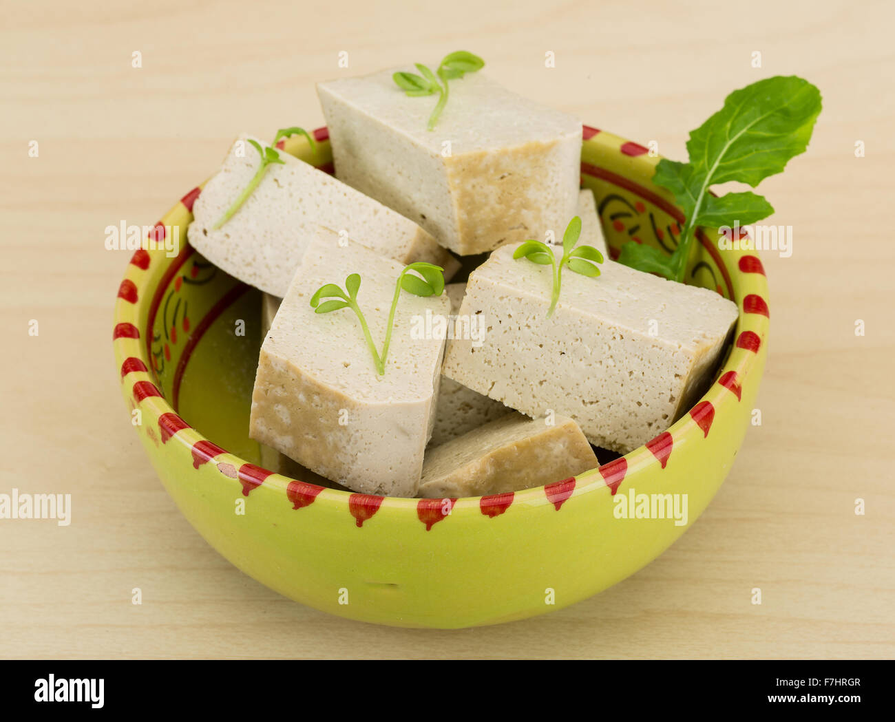 Tofu - soya cheese with herbs on the wood background Stock Photo - Alamy