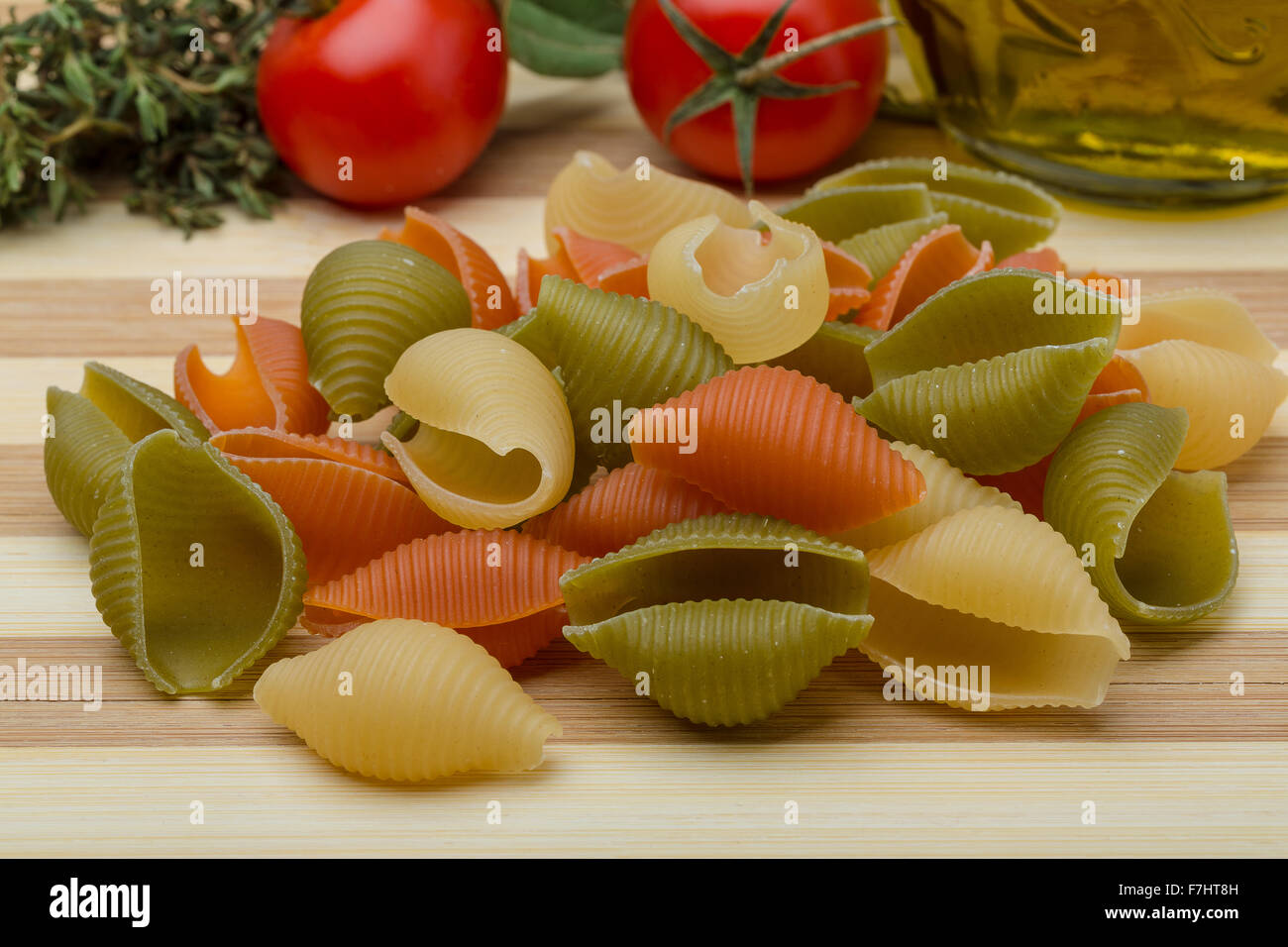 Pipe rigate pasta on the wood background Stock Photo - Alamy