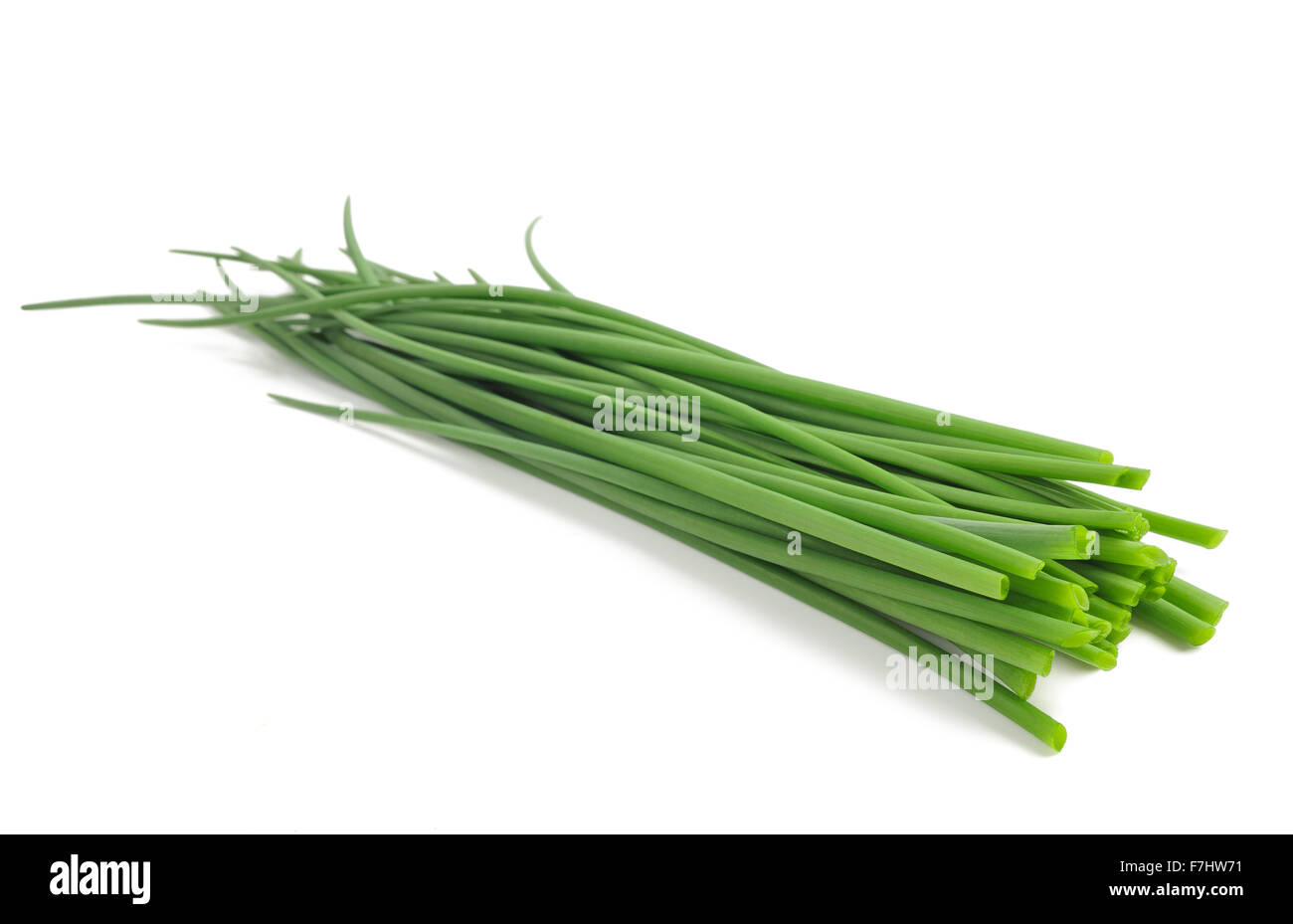 small Chives bunch isolated on white background Stock Photo - Alamy