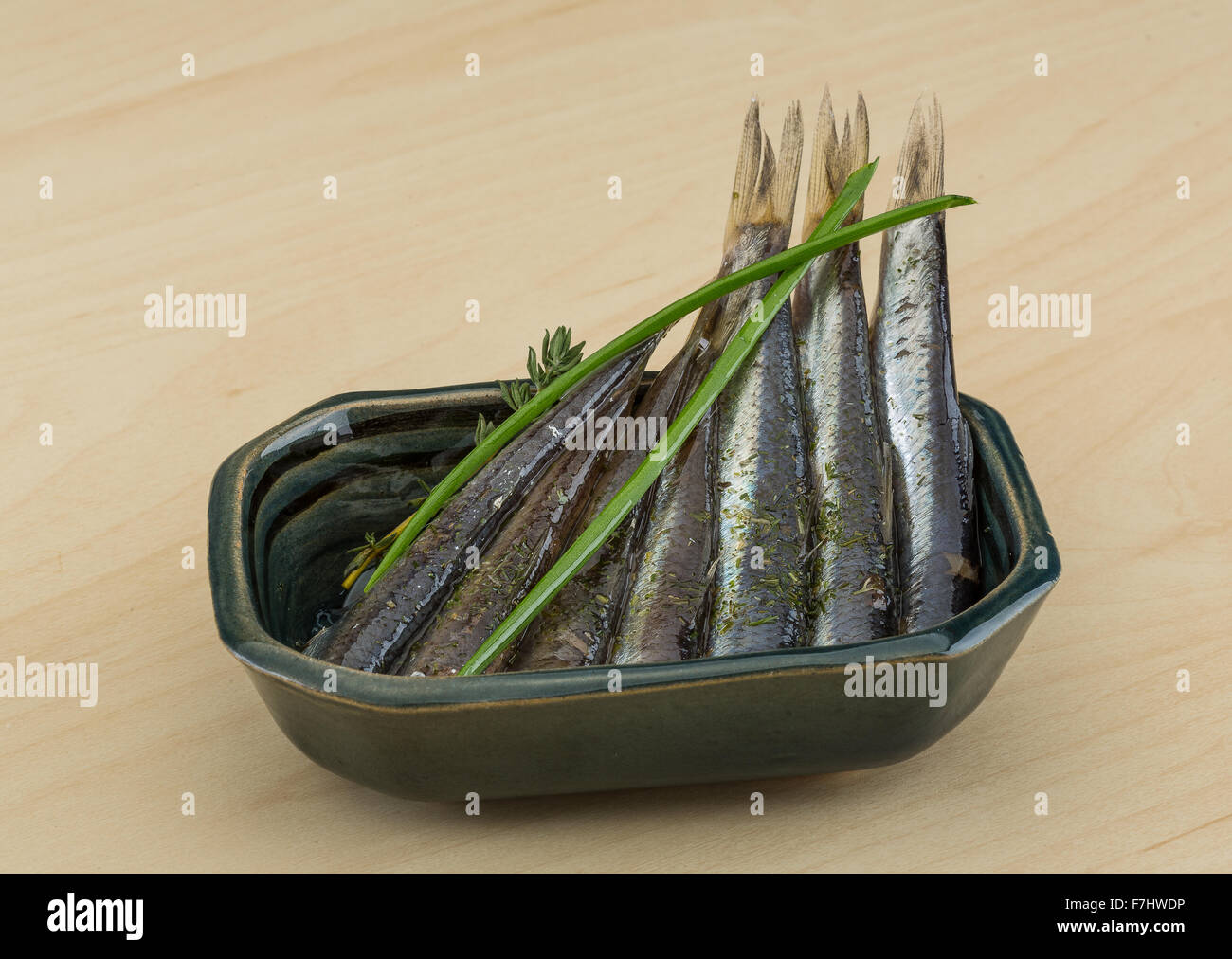 Salted anchovy with spices and herbs - ready for eat Stock Photo - Alamy