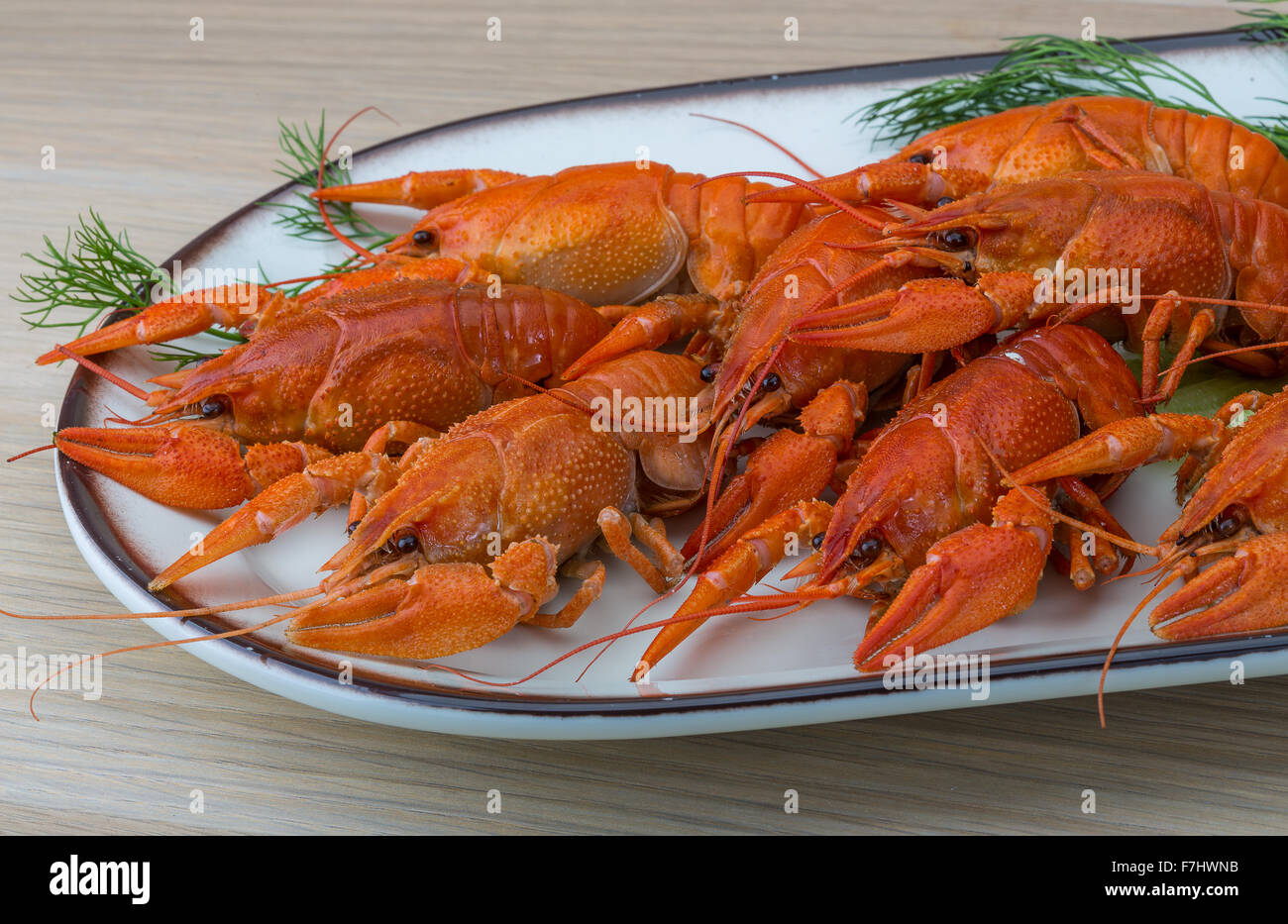 Boiled crayfish in the bowl with dill Stock Photo - Alamy