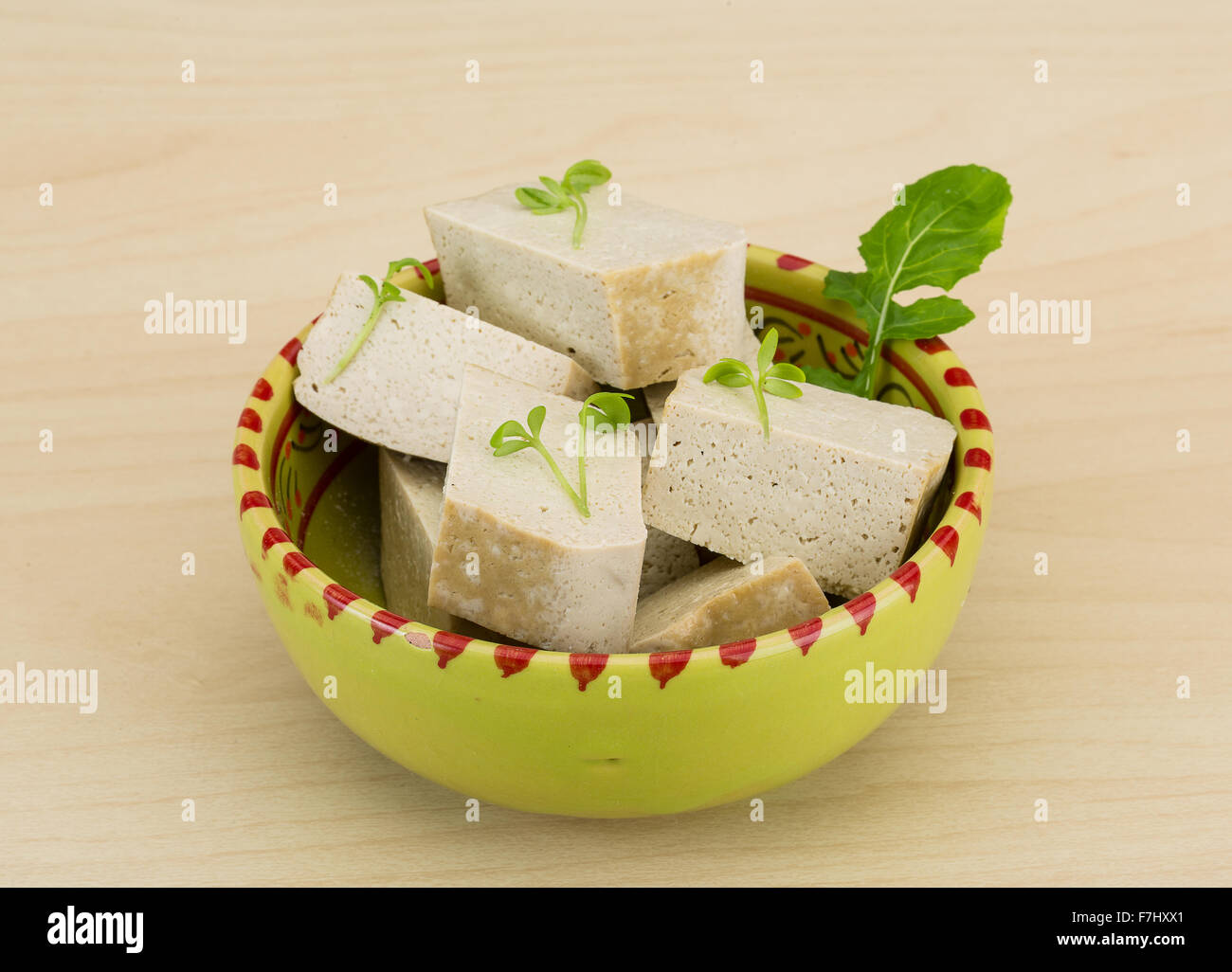 Tofu - soya cheese with herbs on the wood background Stock Photo - Alamy