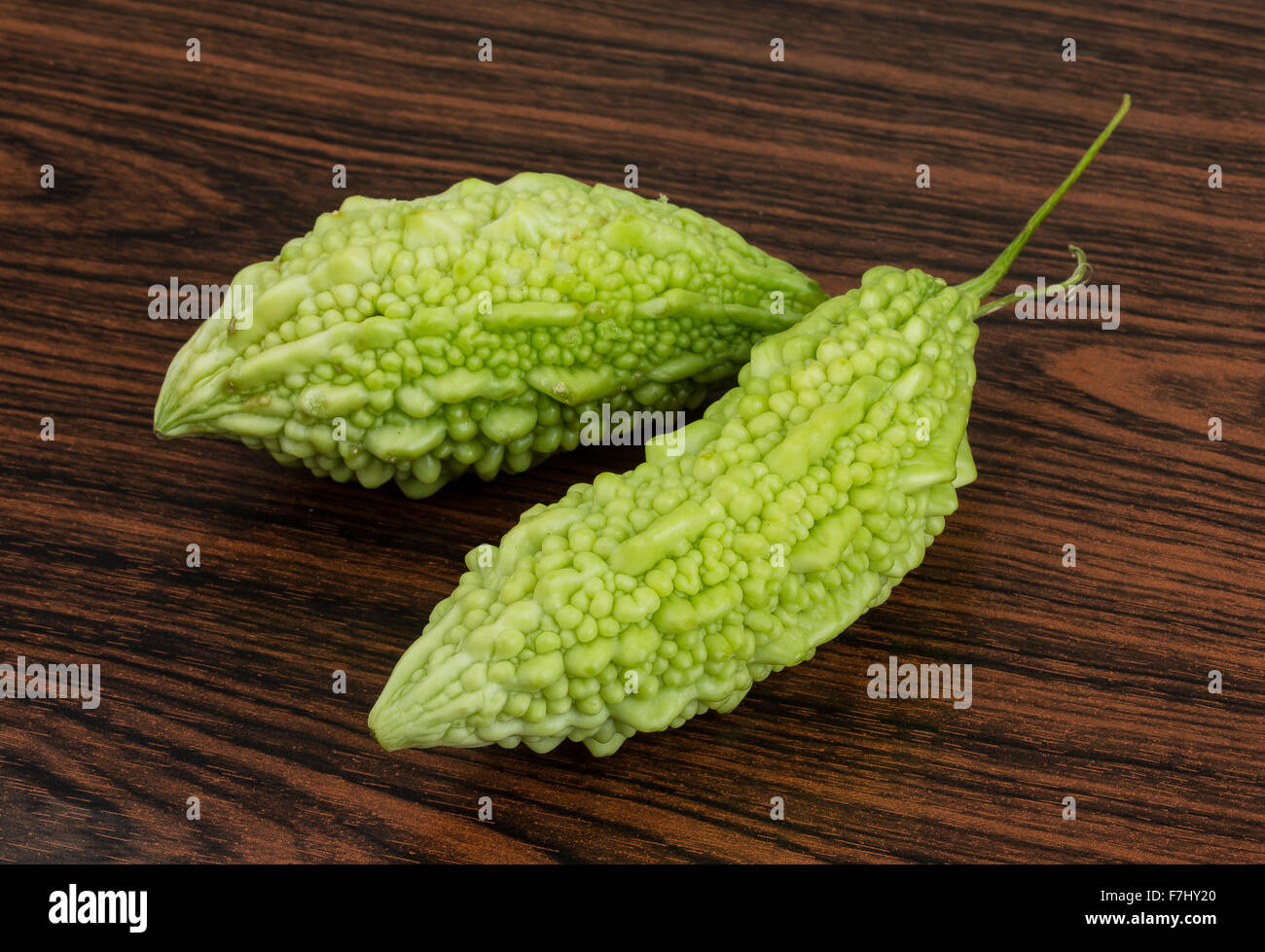 Asian vegetable - momordica on the wood background Stock Photo - Alamy