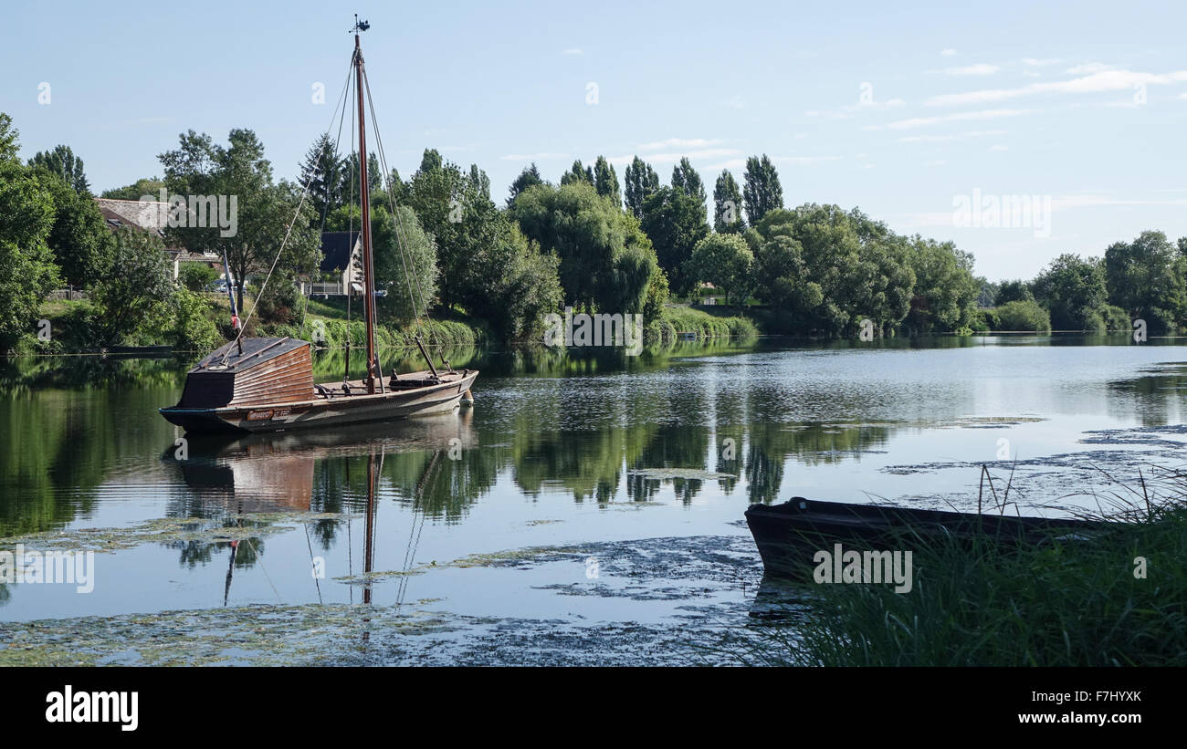 Véretz, France. The river Cher with traditional local boats toue ...