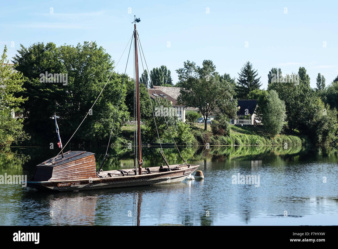 Véretz, France. The river Cher with traditional local boats toue ...