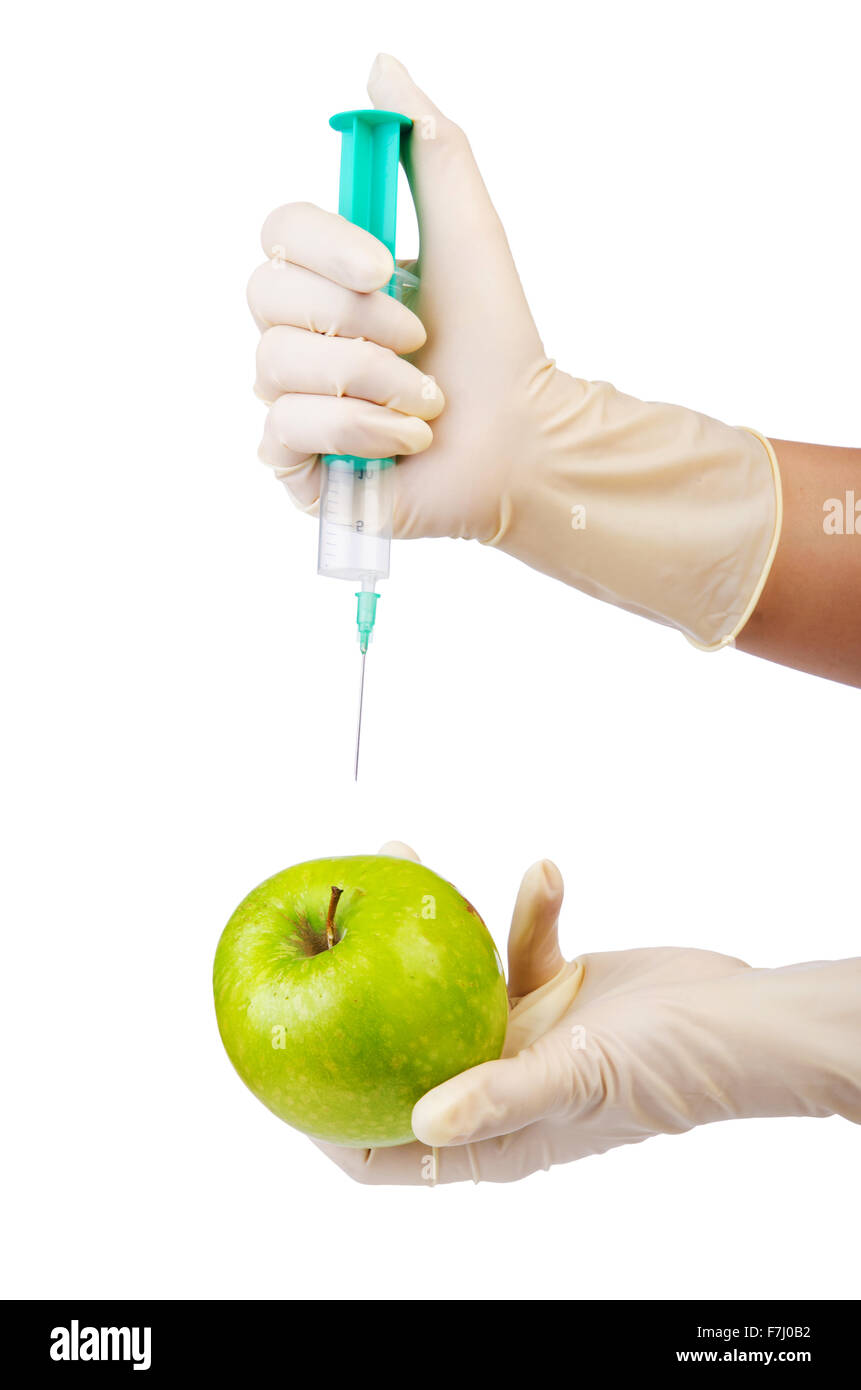 Chemical experiment with apple and syringe Stock Photo - Alamy