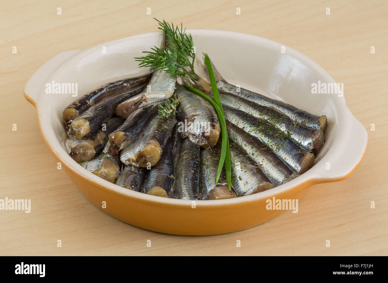 Salted anchovy with spices and herbs - ready for eat Stock Photo - Alamy