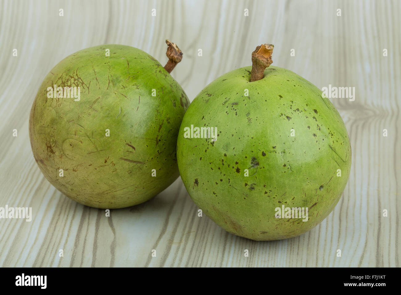 Asian fruit Sapote - on wood background Stock Photo - Alamy