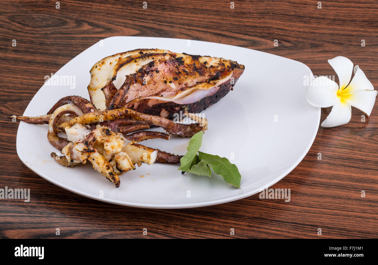 Grilled cuttlefish with spices in the bowl Stock Photo - Alamy