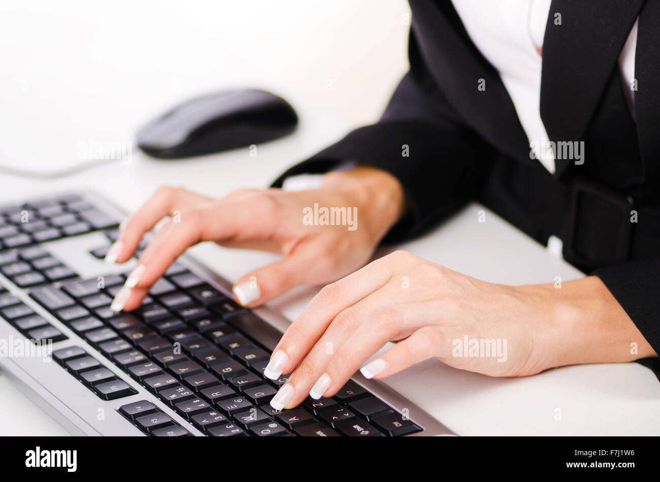Hands working on the keyboard Stock Photo - Alamy